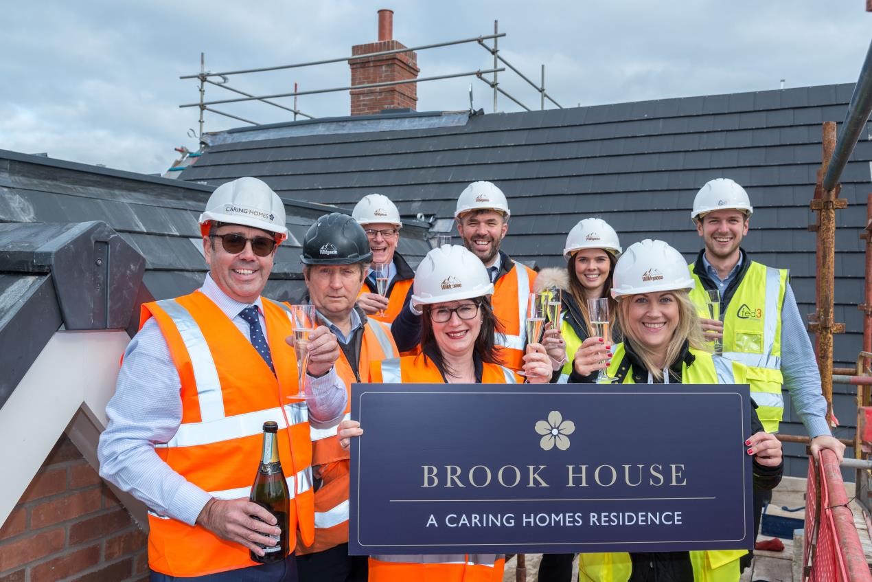 Caring Homes marks construction milestone at care home